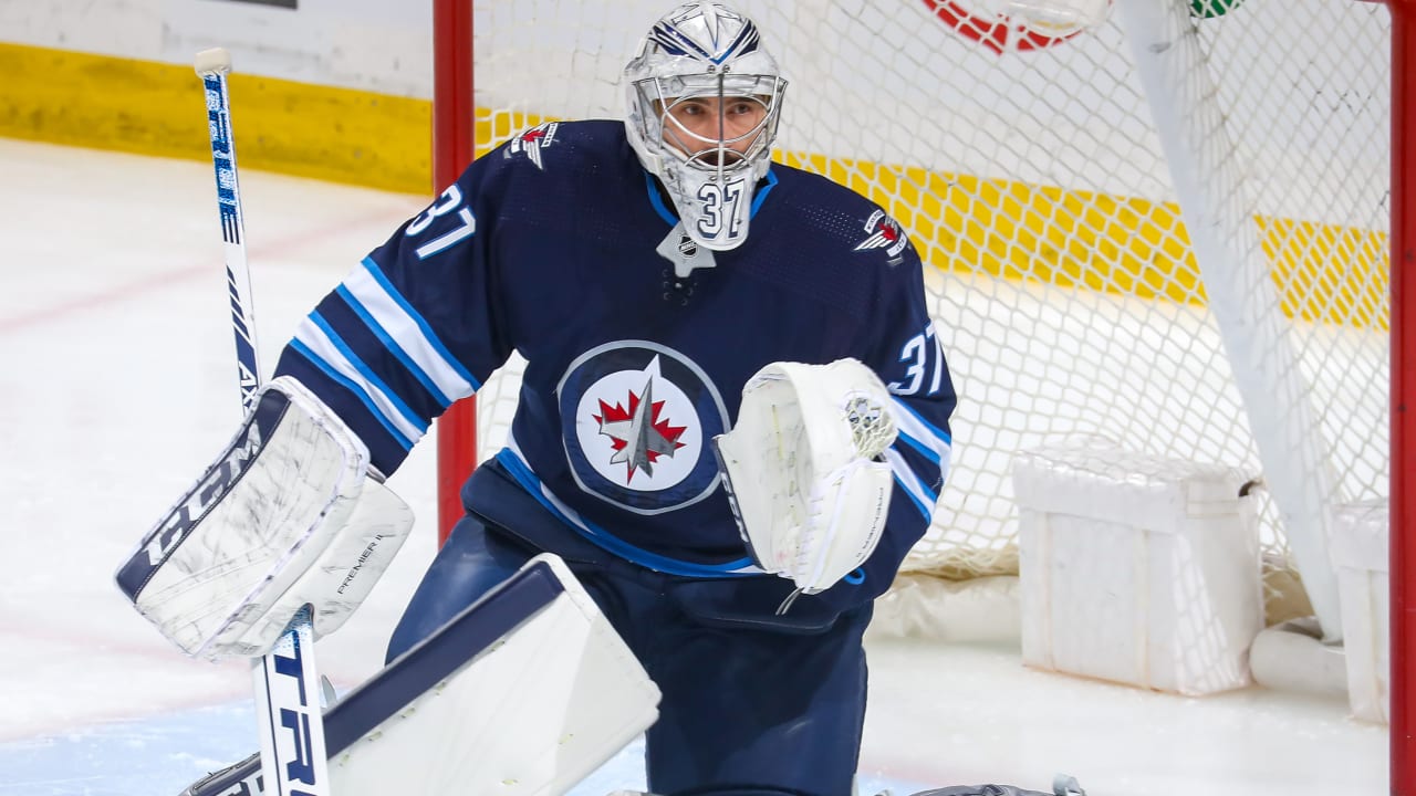 Hellebuyck getting creative with training during season pause for Jets ...
