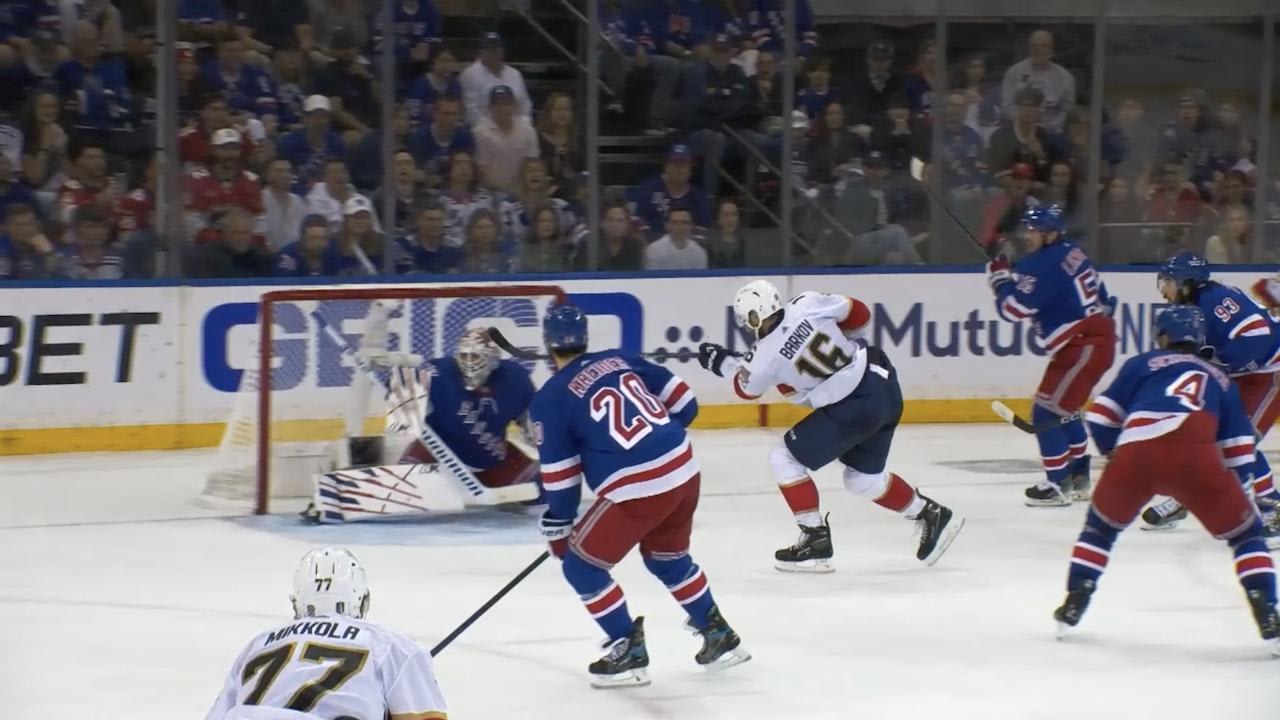 Shesterkin gets a piece of Barkov's shot | NHL.com