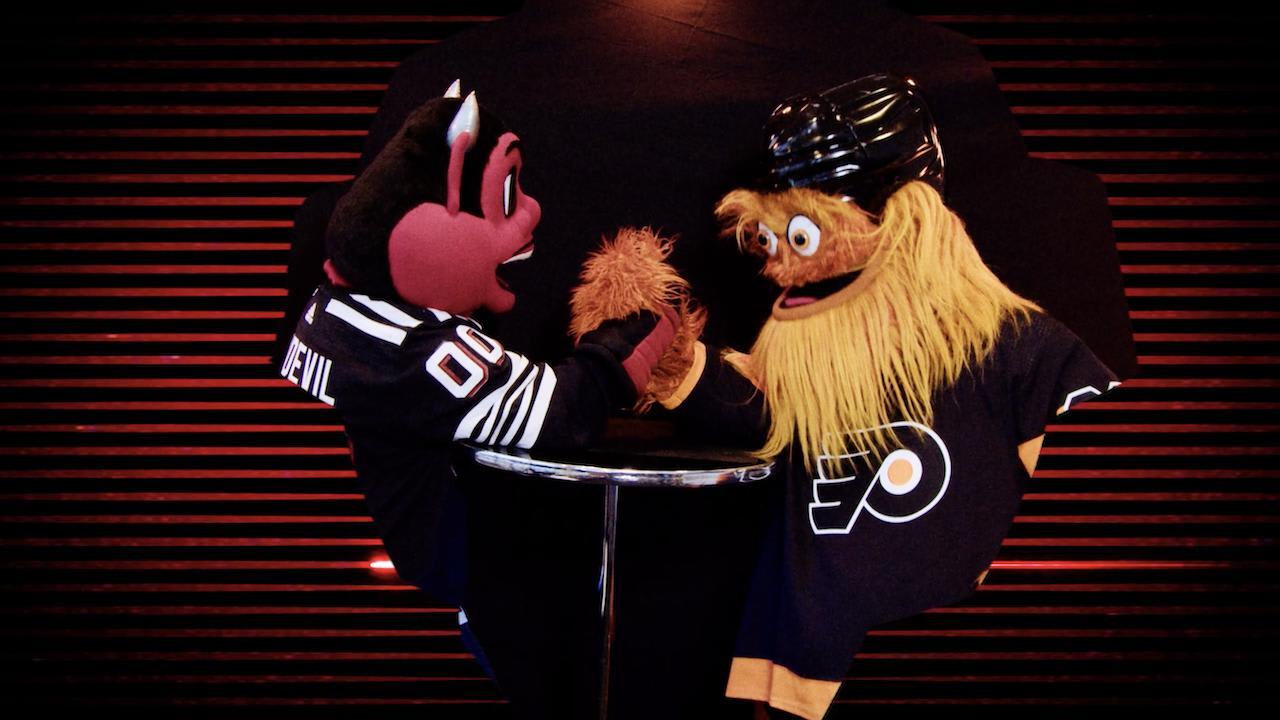 Mascots face off in arm wrestling | NHL.com