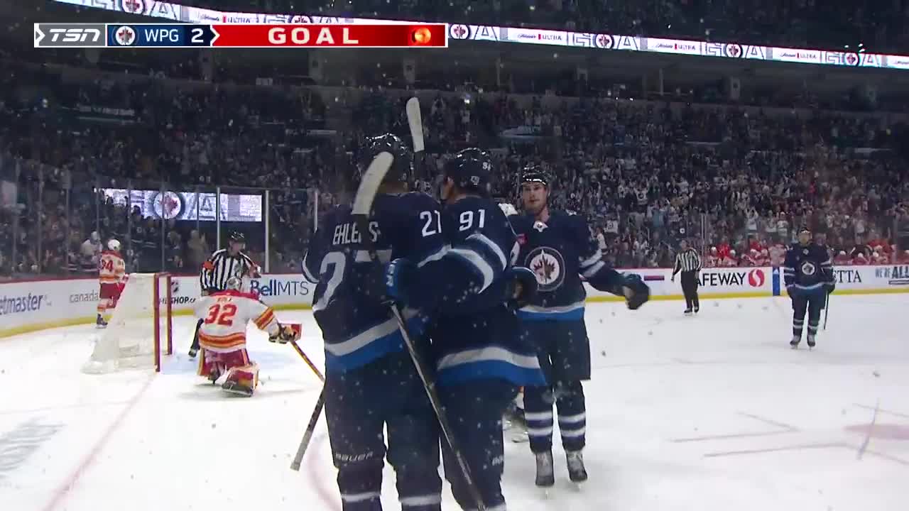 CGY@WPG: Ehlers scores goal against Dustin Wolf | NHL.com