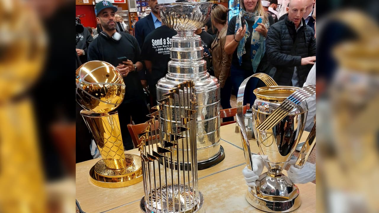Stanley Cup has lunch with fellow sports trophies at Katz's Deli | NHL.com