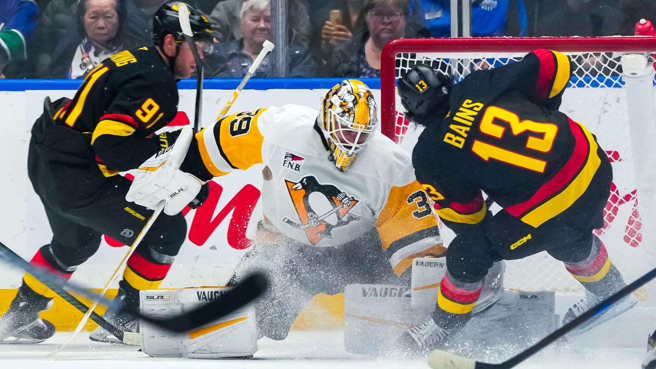 Canucks score 4 straight in 2nd, hold off Penguins for 4th consecutive ...