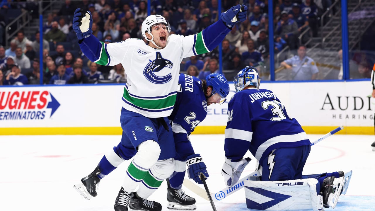 Hughes has 4 assists in return from injury, Canucks surge past ...